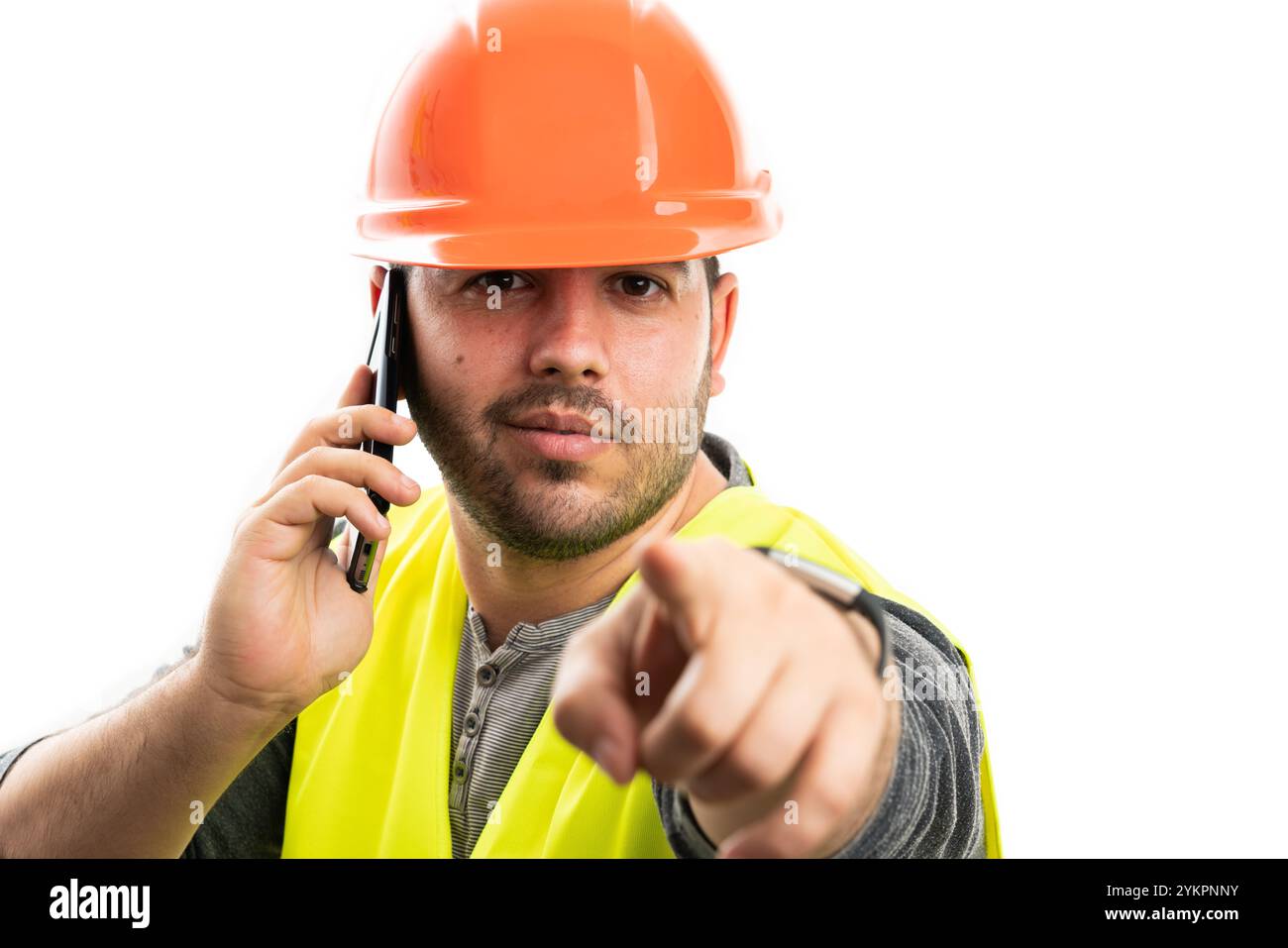 Trustworthy builder man wearing hardhat and work vest uniform talking ...