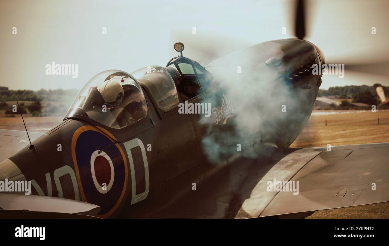 Supermarine Spitfire smoky start up Stock Photo - Alamy