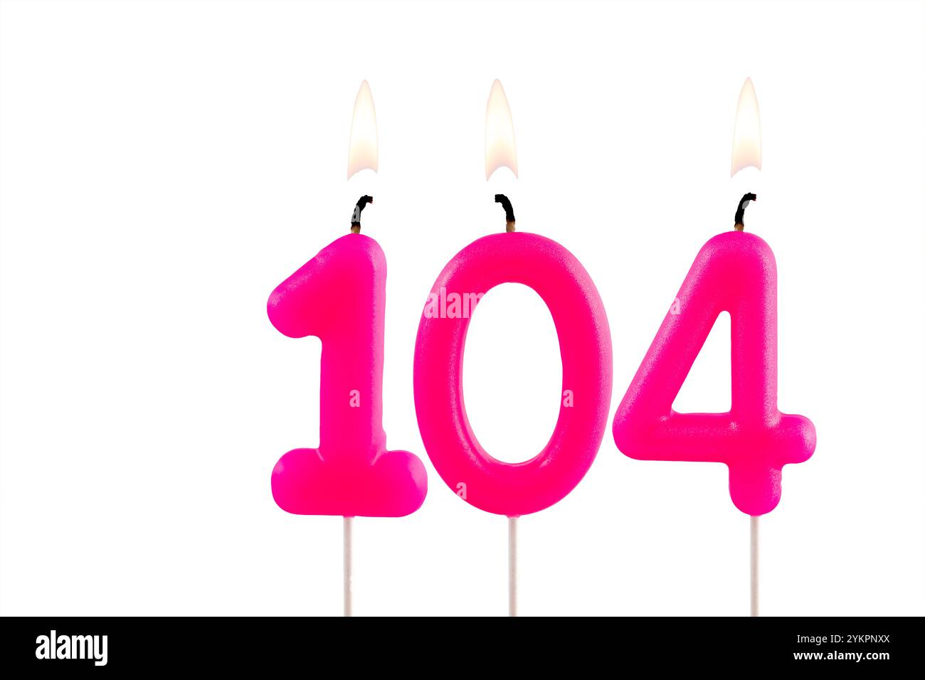 Pink number 104 birthday candle lit on white background Stock Photo - Alamy
