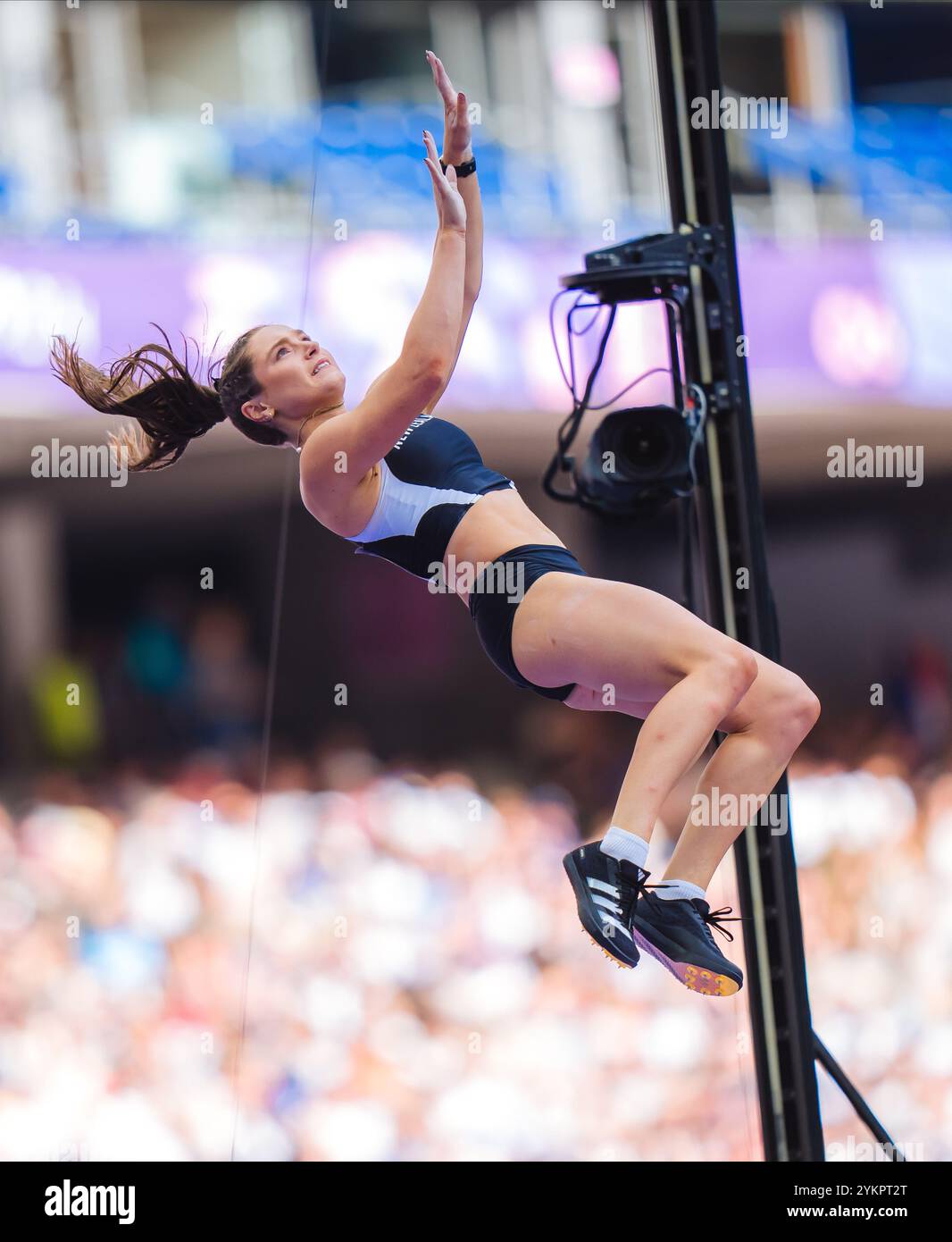 Imogen Ayris participating in the pole vault at the Paris 2024 Olympic ...