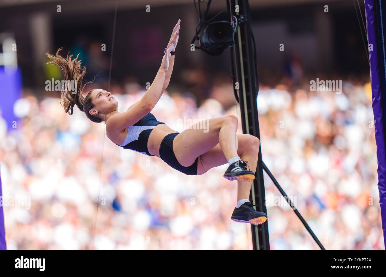 Imogen Ayris participating in the pole vault at the Paris 2024 Olympic ...