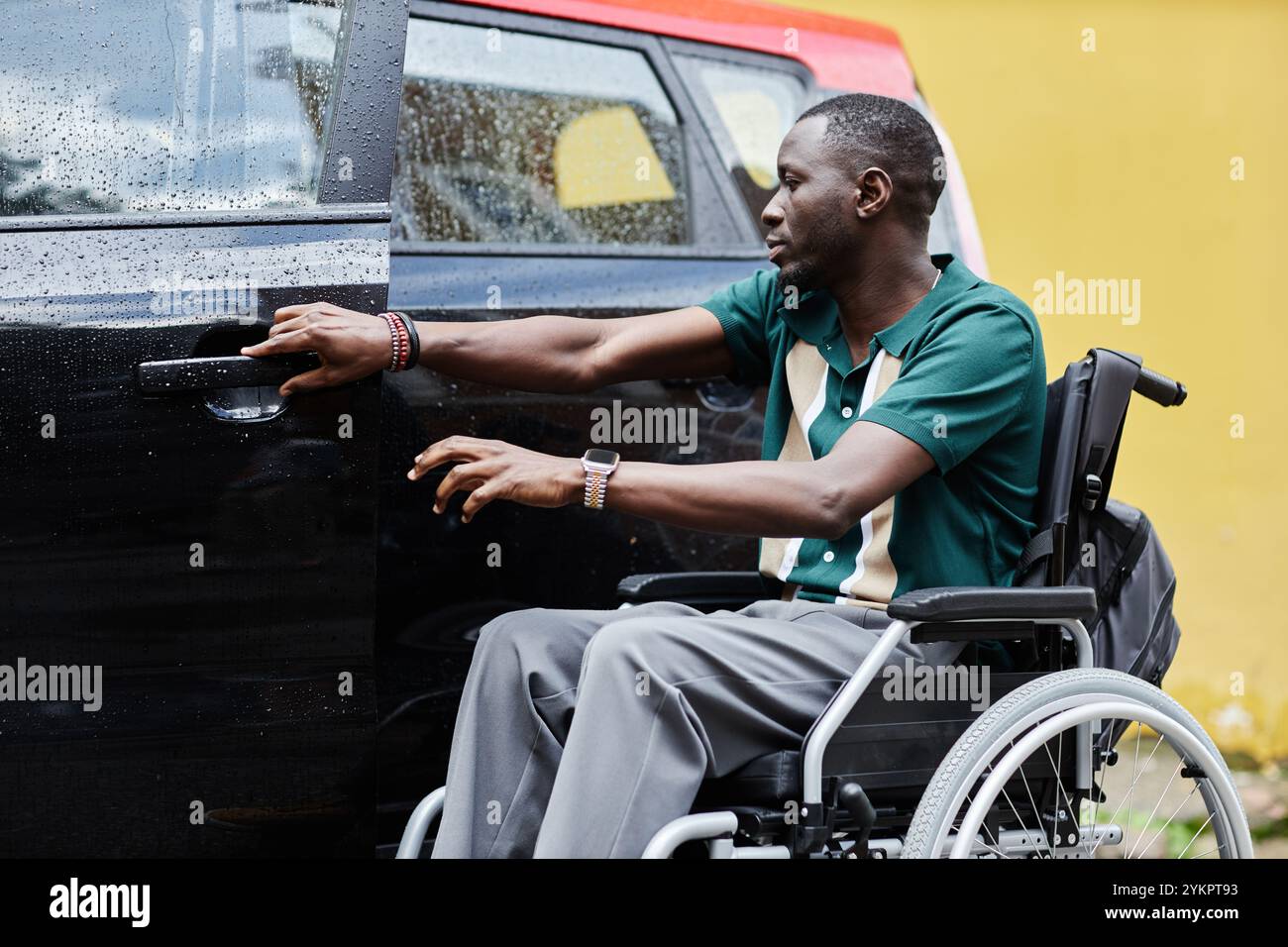 Side view portrait of young African American man with disability ...