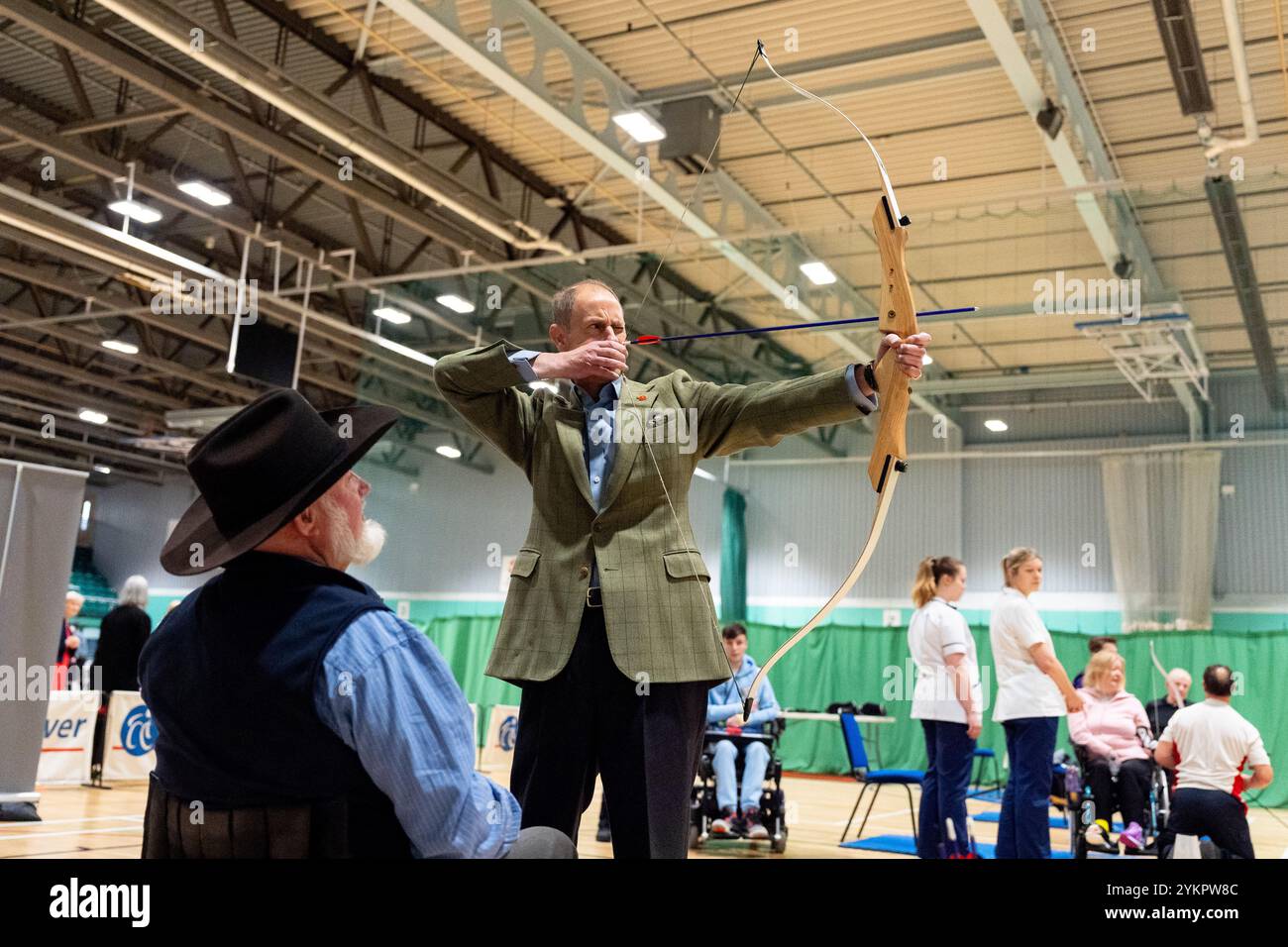 The Duke of Edinburgh takes part in archery during a visit to Stoke ...