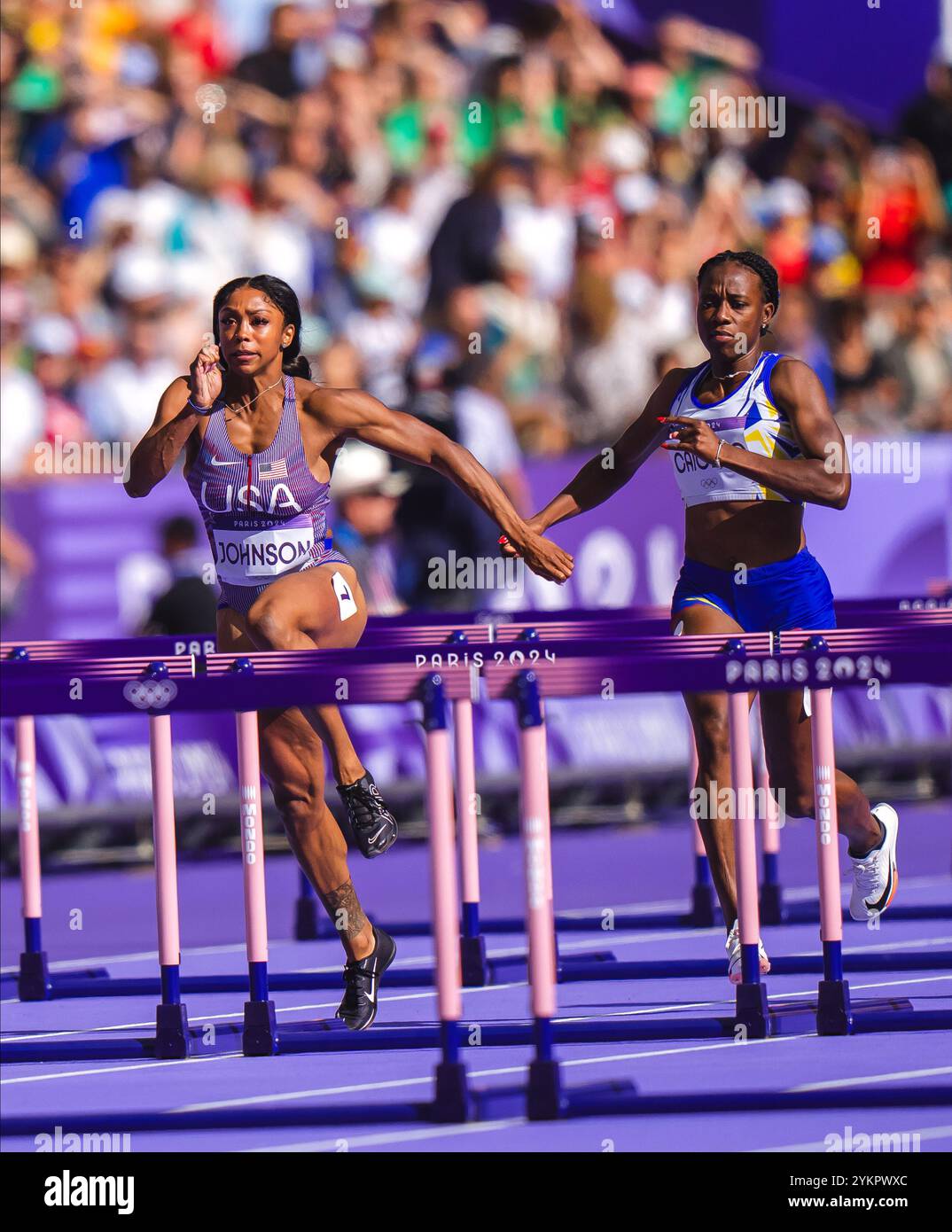 Alaysha Johnson participating in the 100 meters hurdles at the Paris ...