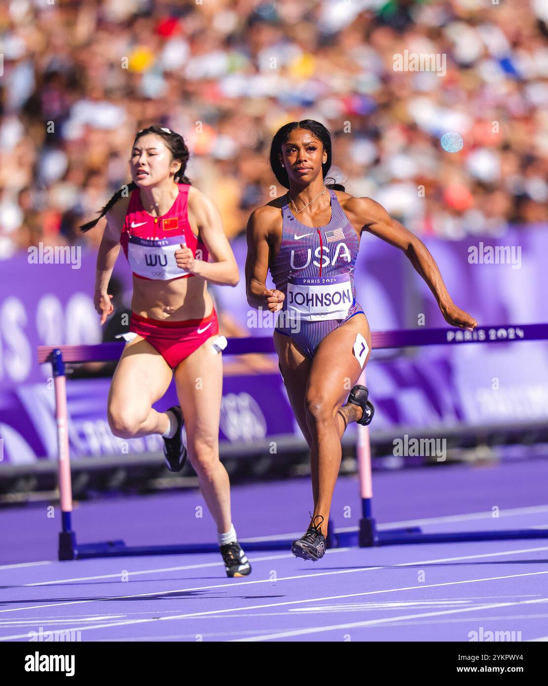 Alaysha Johnson participating in the 100 meters hurdles at the Paris ...