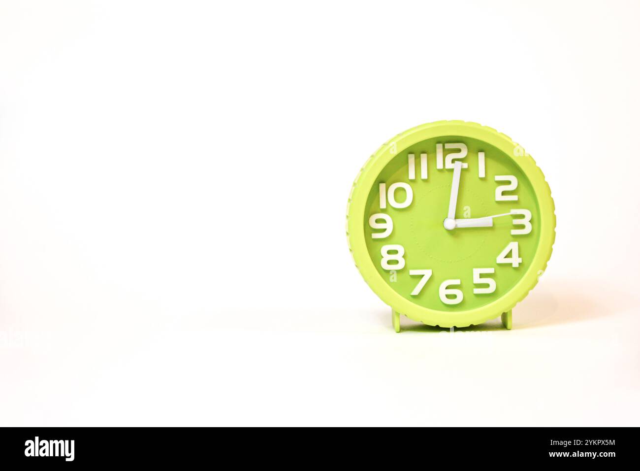Green clock. Alarm clock on a plain background. Time, watch print set ...