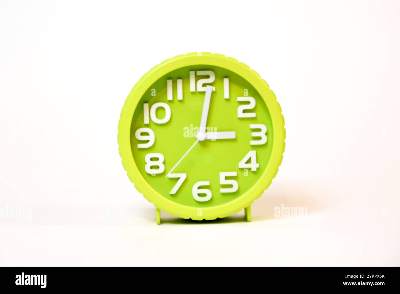 Green clock. Alarm clock on a plain background. Time, watch print set ...