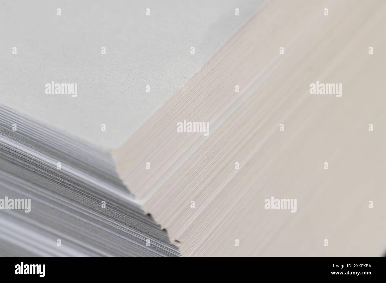 sheets of paper are used for printing , close-up of a piece of new pulp ...