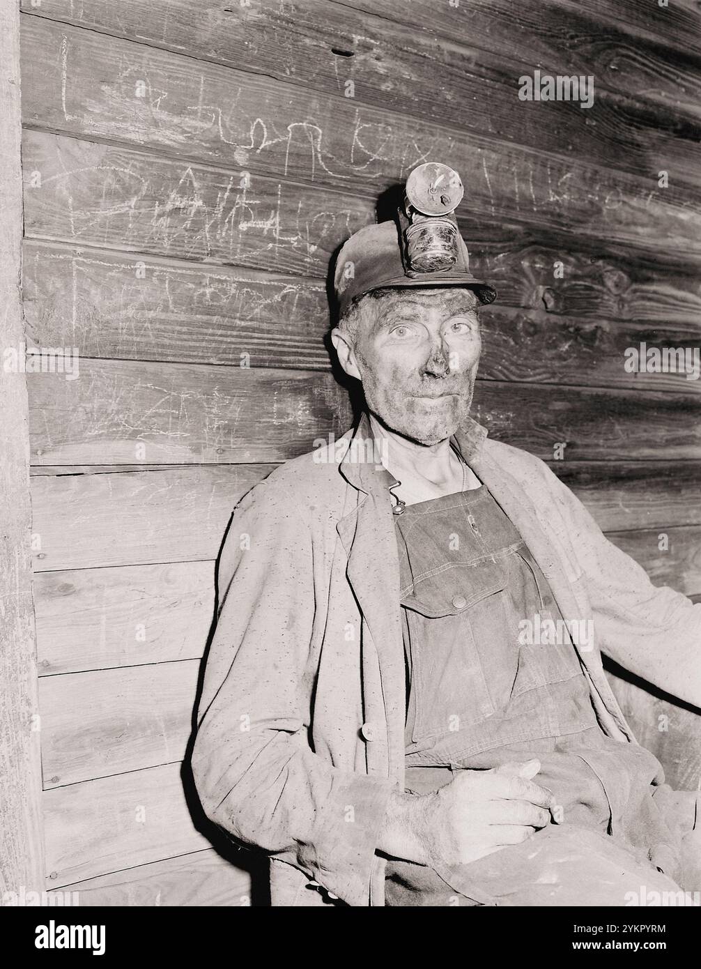 Vintage photo of American miners' life. Blaine Sergent, coal loader. P ...