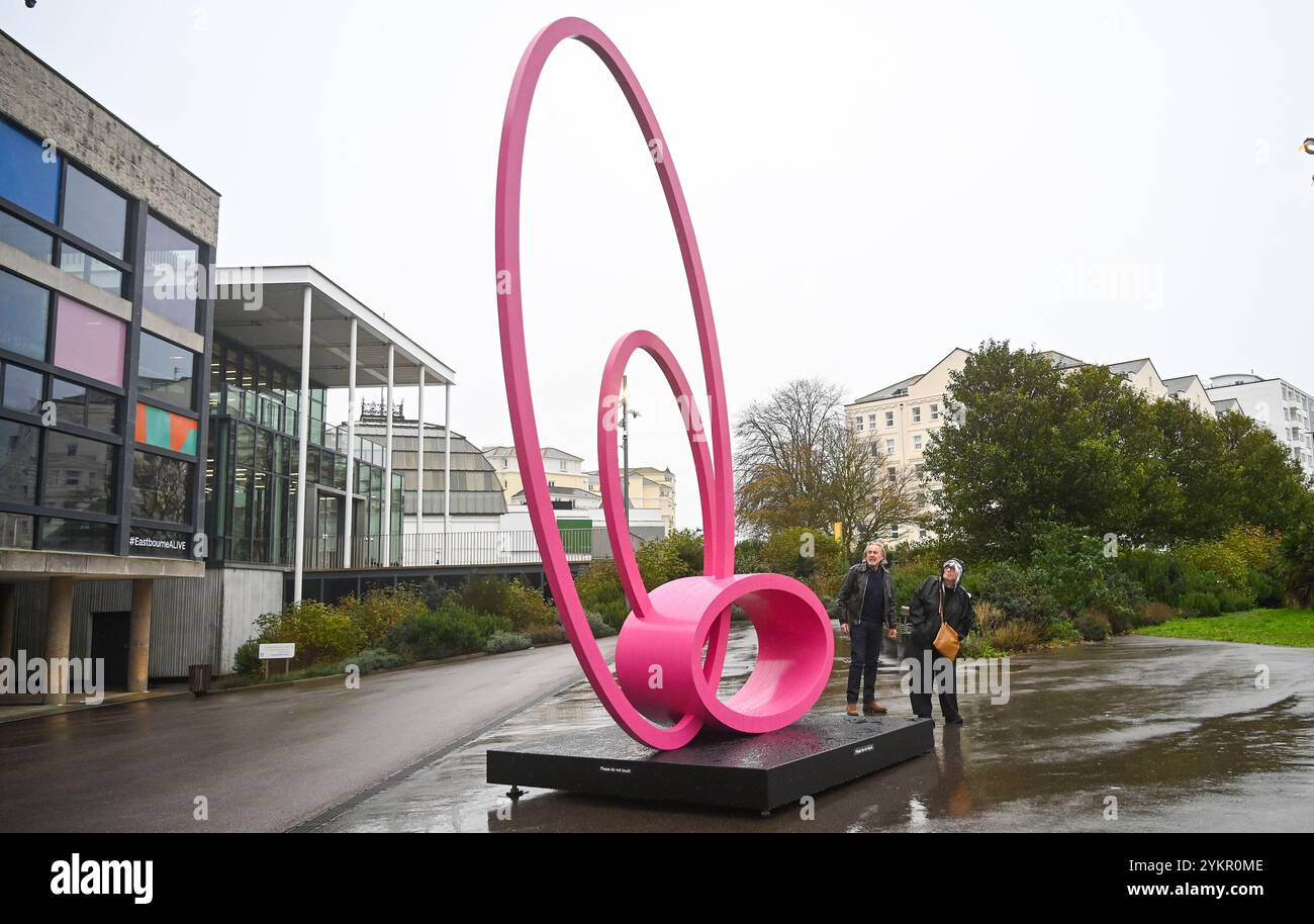 Eastbourne UK 19th November 2024 - Visitors pass the iconic sculpture ...