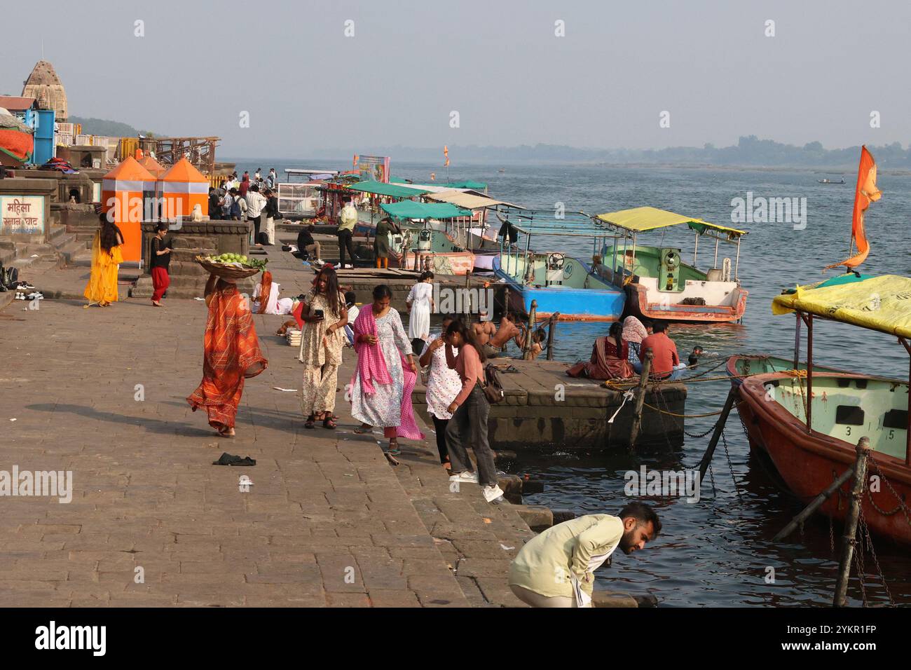 Bathing ghats beside the Narmada River at Maheshwar, Madhya Pradesh ...