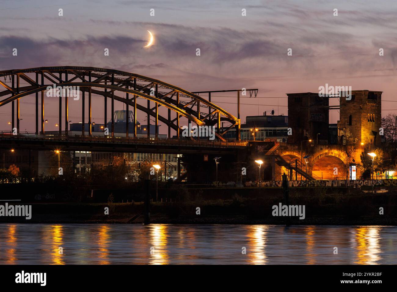 crescent moon over the Suedbruecke (South bridge), railroad bridge over ...