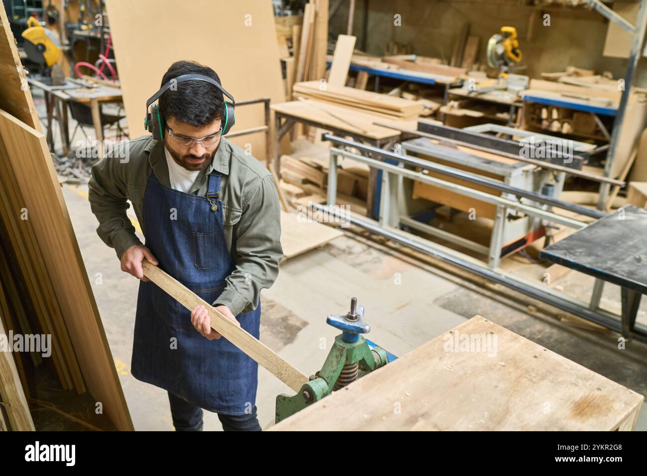 Focused carpenter wearing safety gear hi-res stock photography and ...