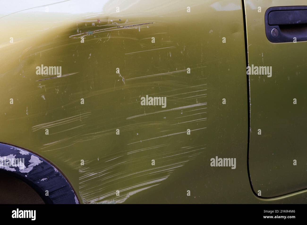 Dented car side with scratches from accident without paint, Spain Stock ...