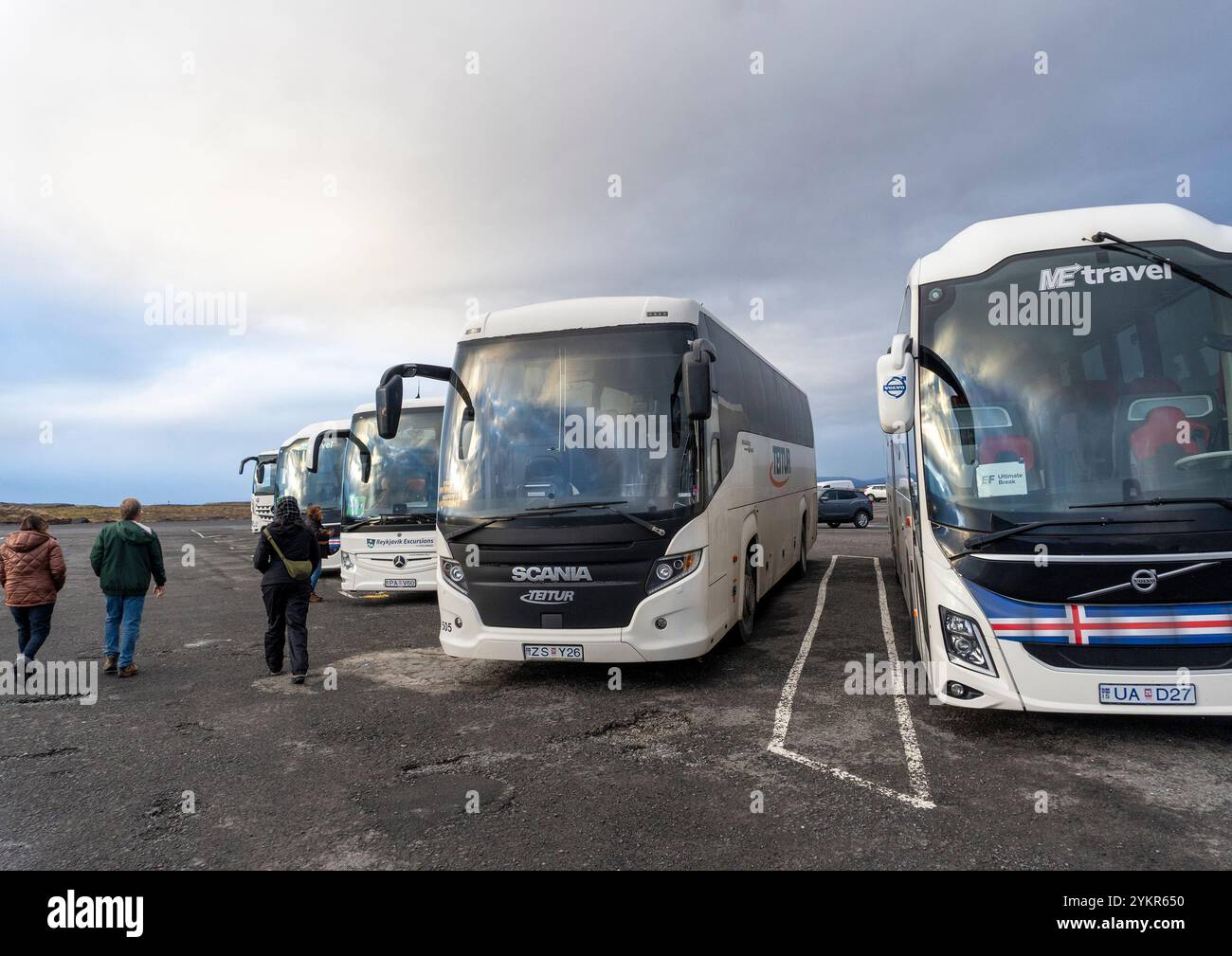 Tourists walking towards a tour bus in Reykjavík, Iceland Stock Photo ...