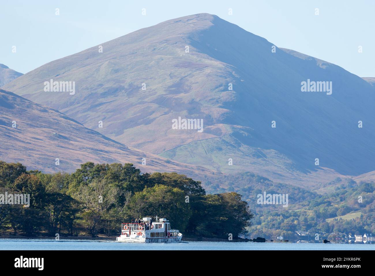 Tourist Sightseeing boat and Beinn Eich from the eastern shore of Loch ...