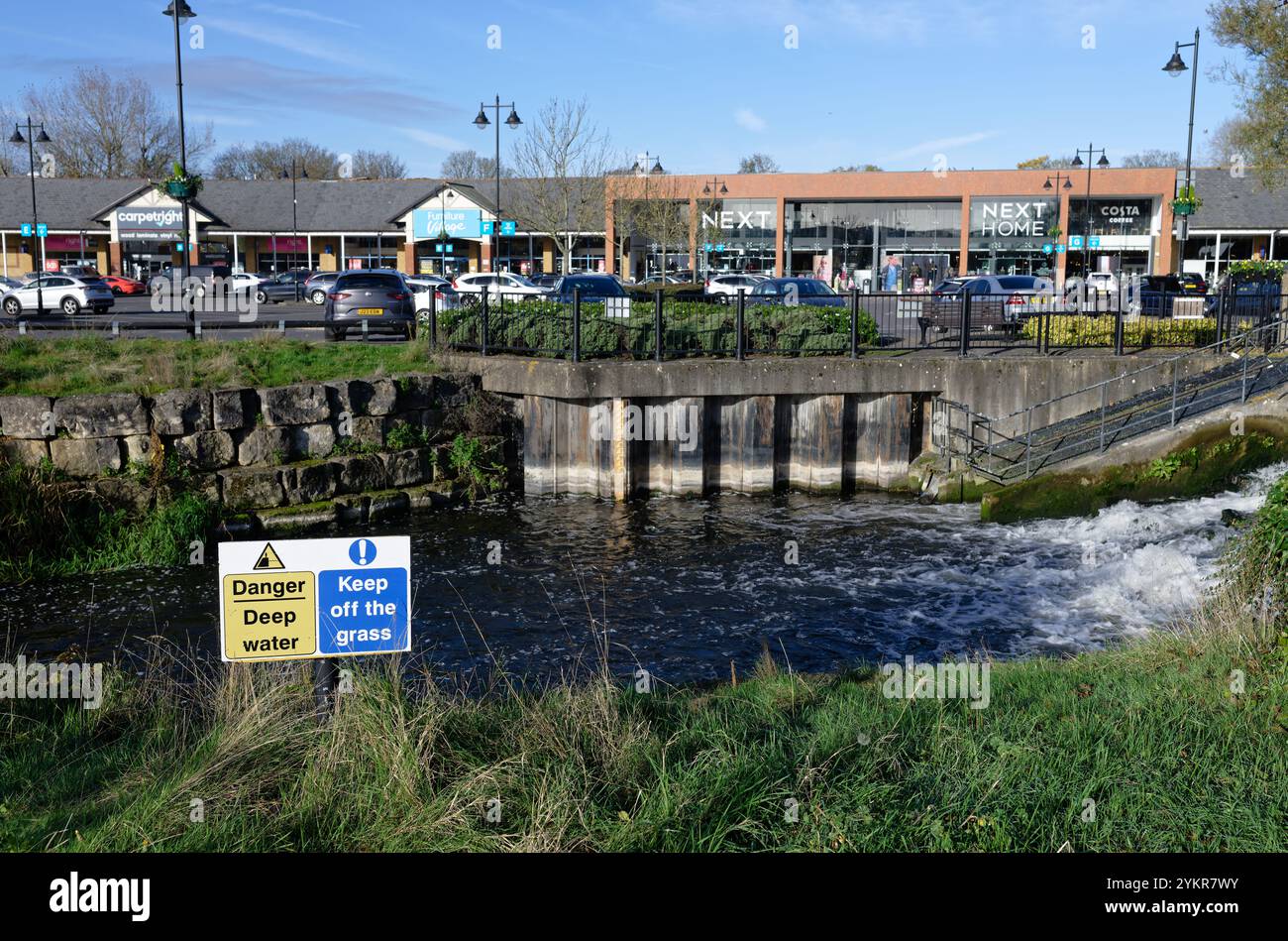 Churning water after the weir on the Wraysbury River at the Two Rivers ...