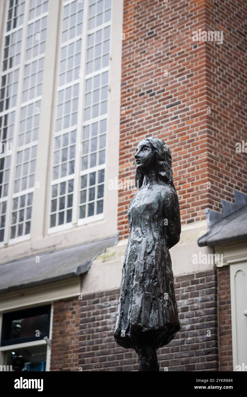 Statue of Anne Franck in front of the Westerkerk church in Amsterdam ...