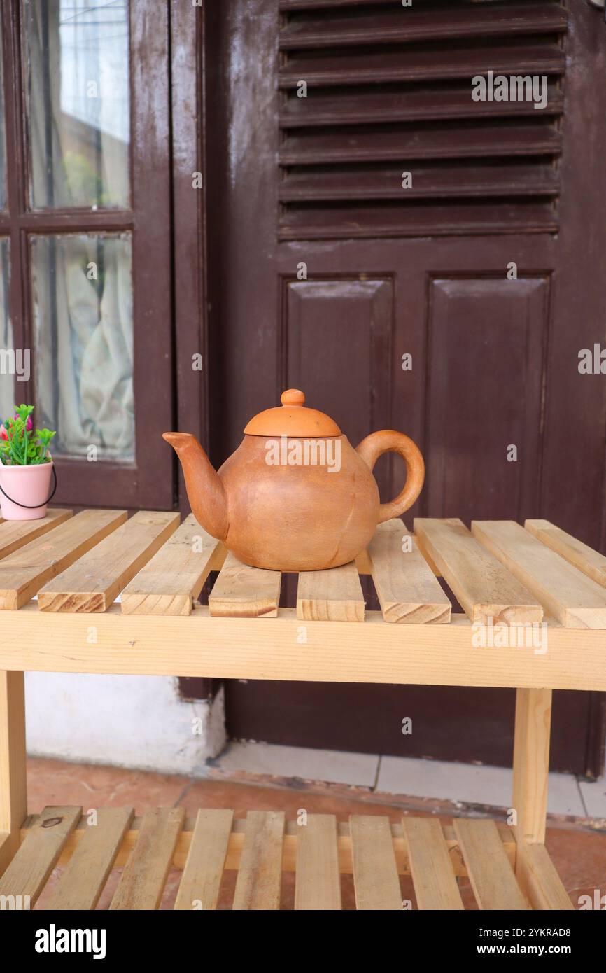 Clay teapot on the terrace. Traditional way of enjoying tea Stock Photo ...