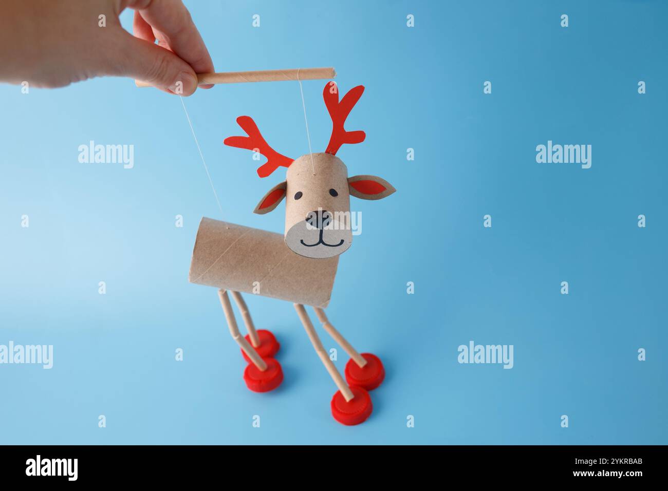 Child holding puppet string hi-res stock photography and images - Alamy