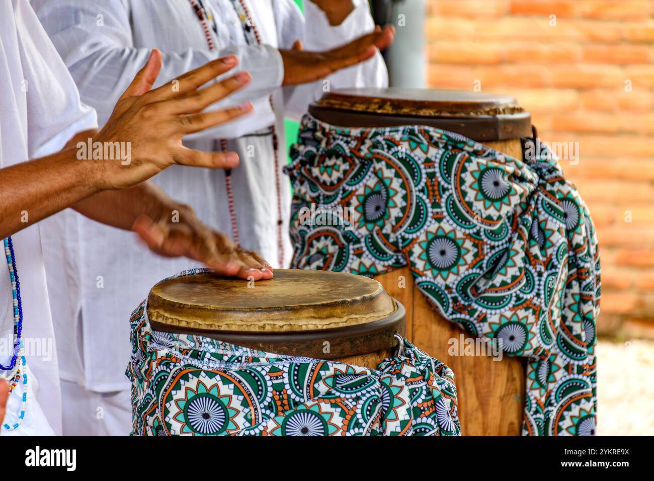 The atabaque being played by percussionists during a religious festival ...