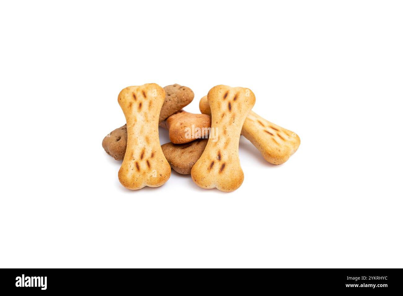 Bone shaped doggy treats pile isolated on white background Stock Photo ...