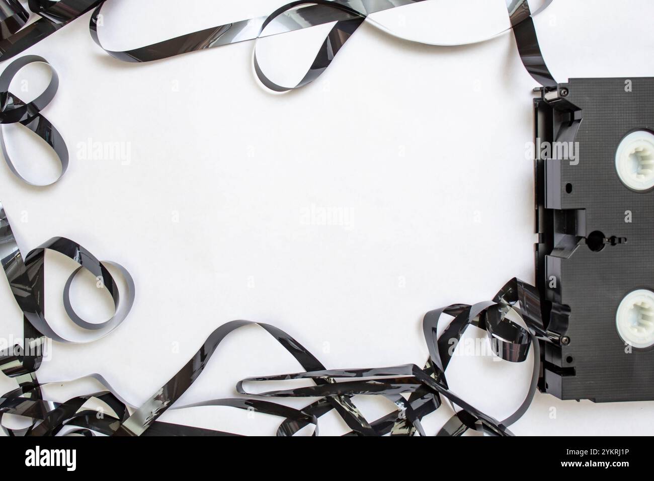 Abstract frame made with video casette tape ribbon on white Stock Photo ...