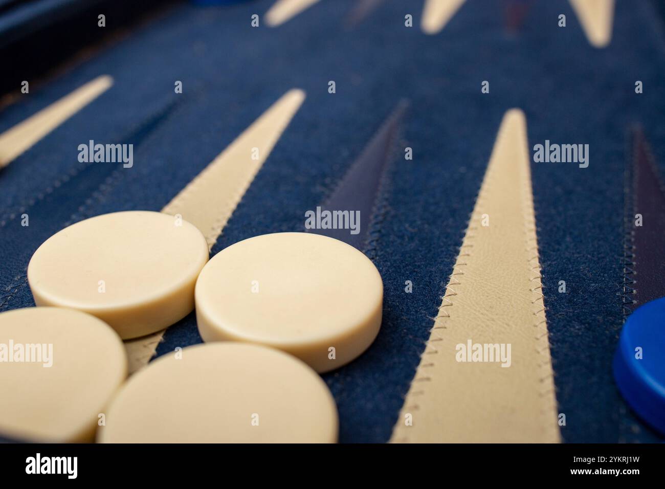 Backgammon game close up with blue felt Stock Photo - Alamy