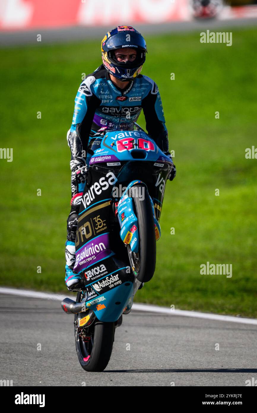 The Colombian rider of the CFMOTO team, Moto3 world champion, wheelies ...