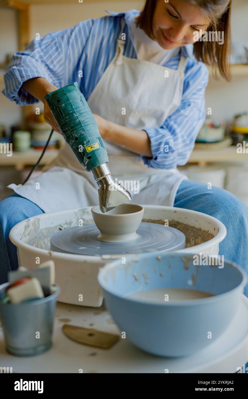 Creating beautiful pottery in a sunny studio filled with creativity ...