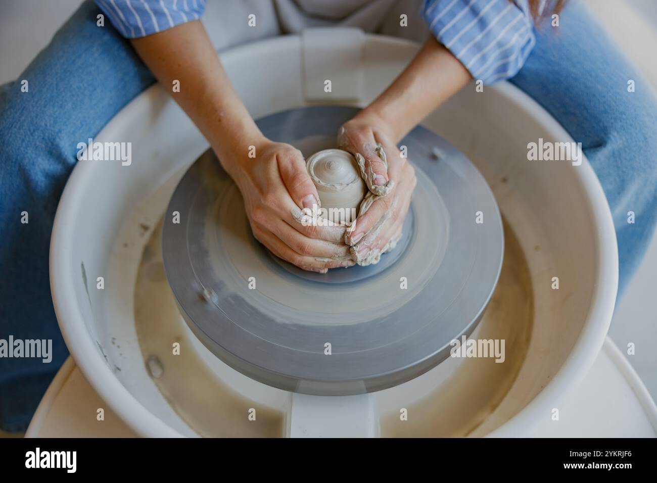 Discover the intricate art of Artisan Pottery Making on a Wheel and its ...