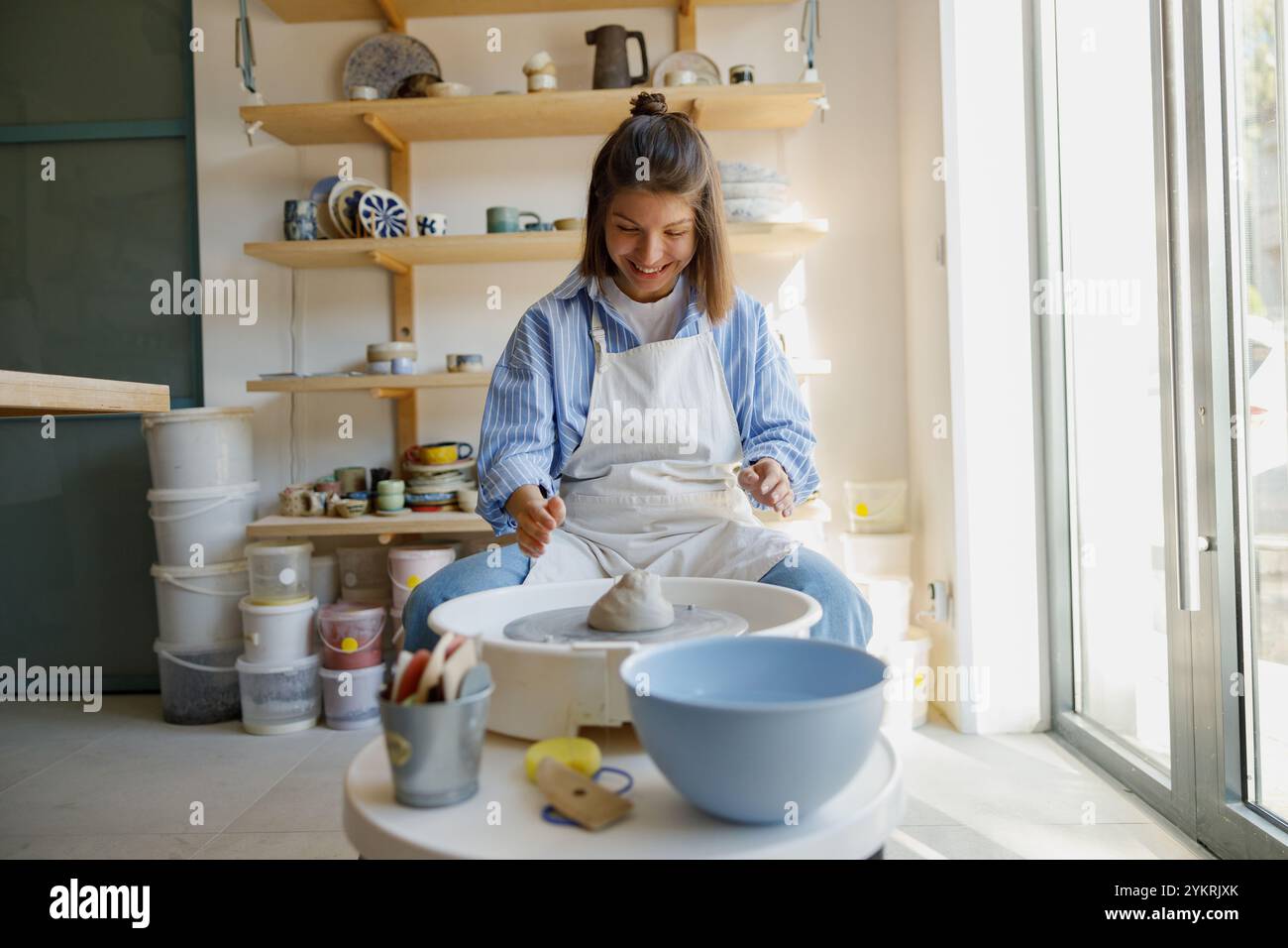 A Creative Woman Engaging in Pottery Crafting Activities within a ...