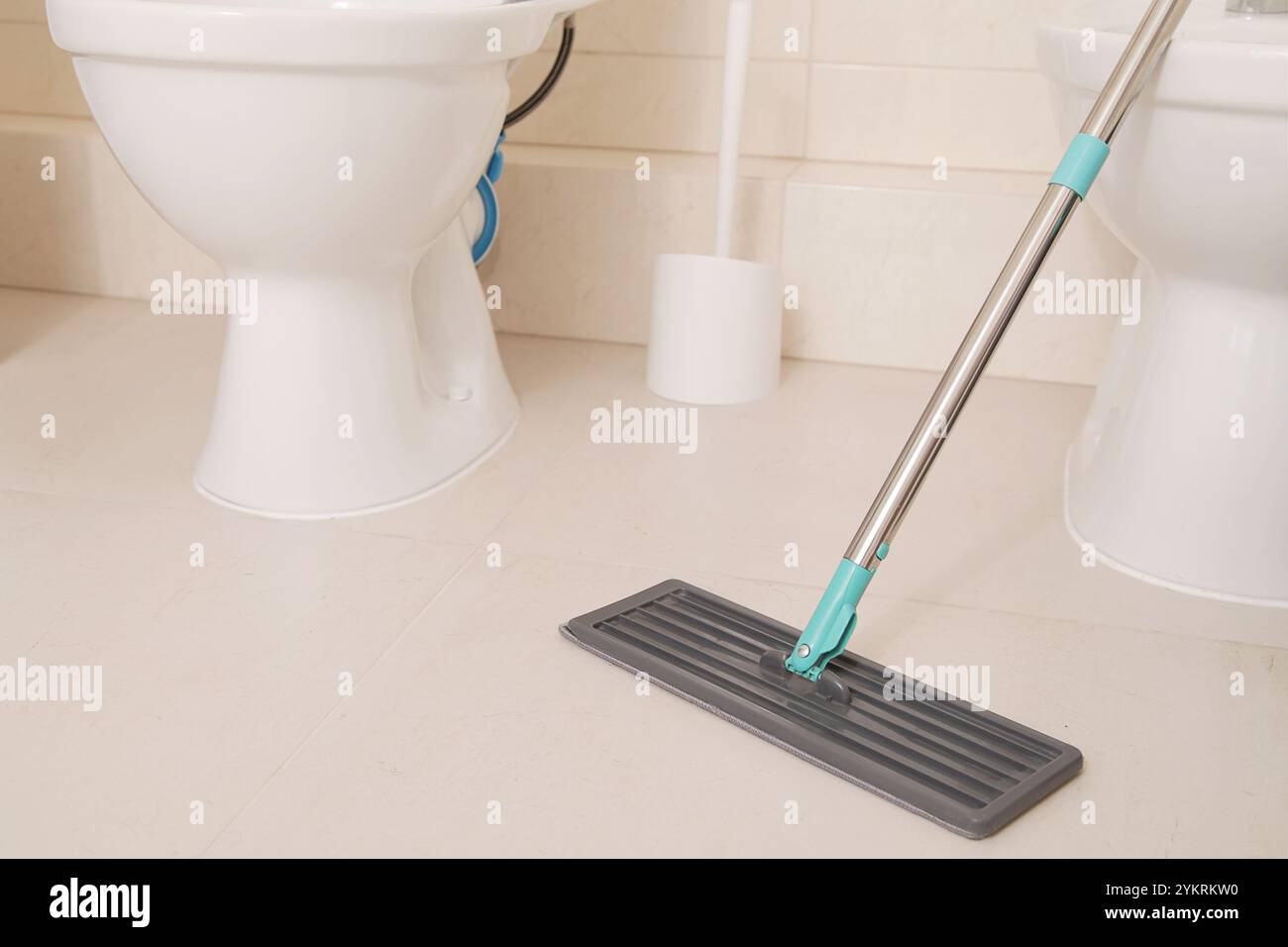 Cleaning Floor in Bathroom, WC. Mop close-up. Clean Surface Big Ceramic ...