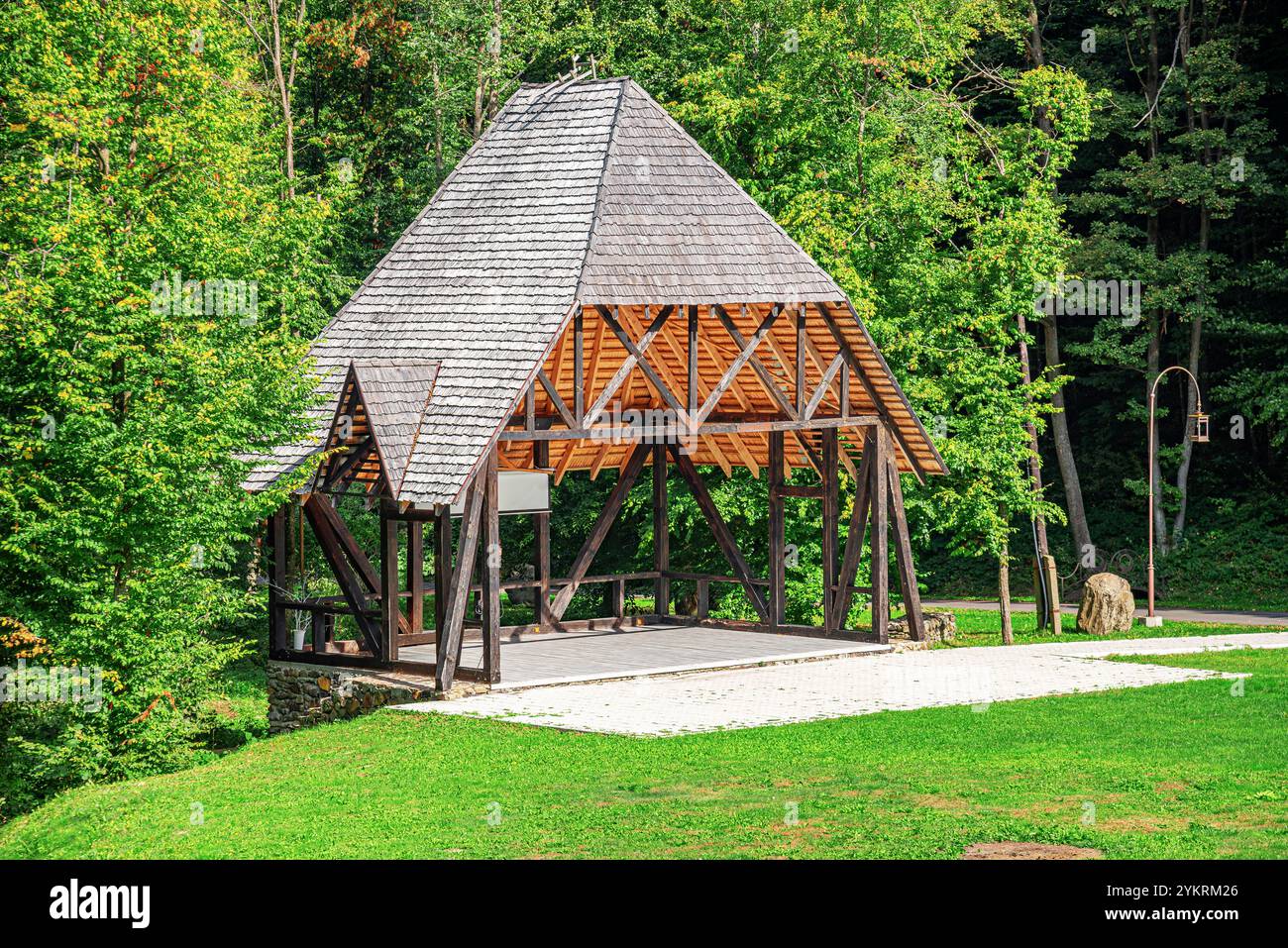 Wooden gazebo in the forest Stock Photo - Alamy