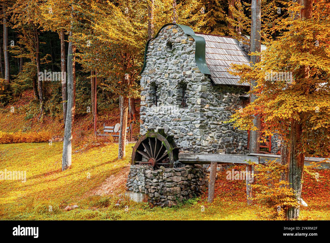 Old stone mill in the park Stock Photo - Alamy