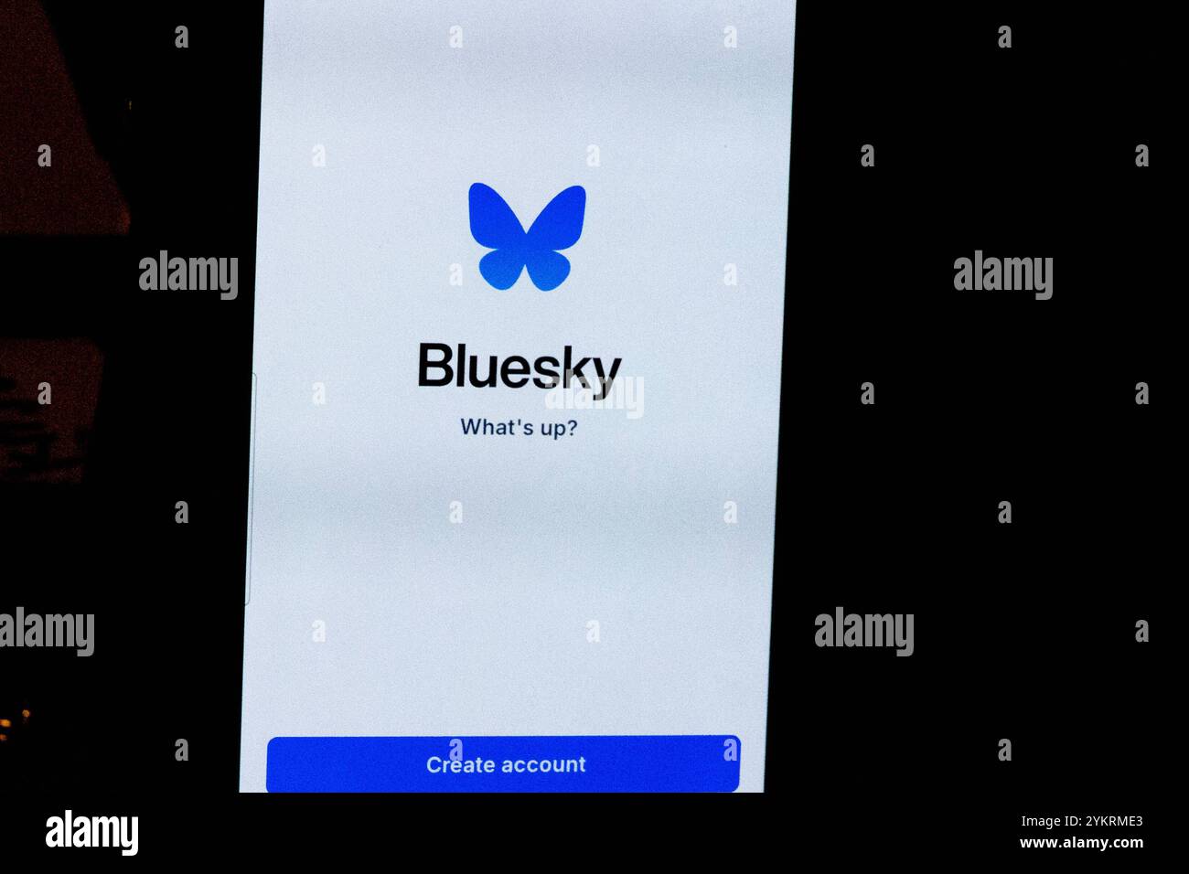 This photo illustration, the Bluesky logo is displayed on a smartphone ...