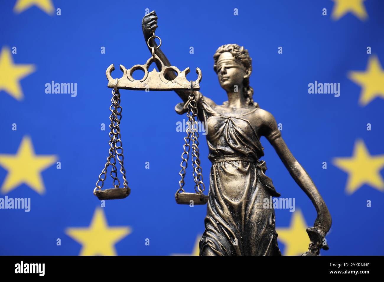 Figure of Lady Justice against European Union flag Stock Photo - Alamy