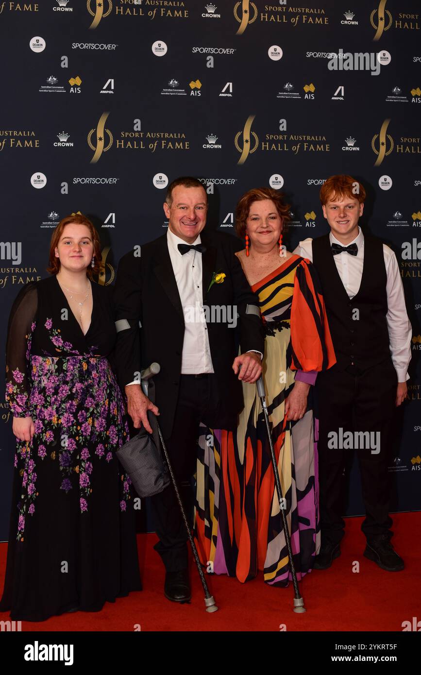 Paralympian Michael Milton (CL) and his family attending the red carpet ...