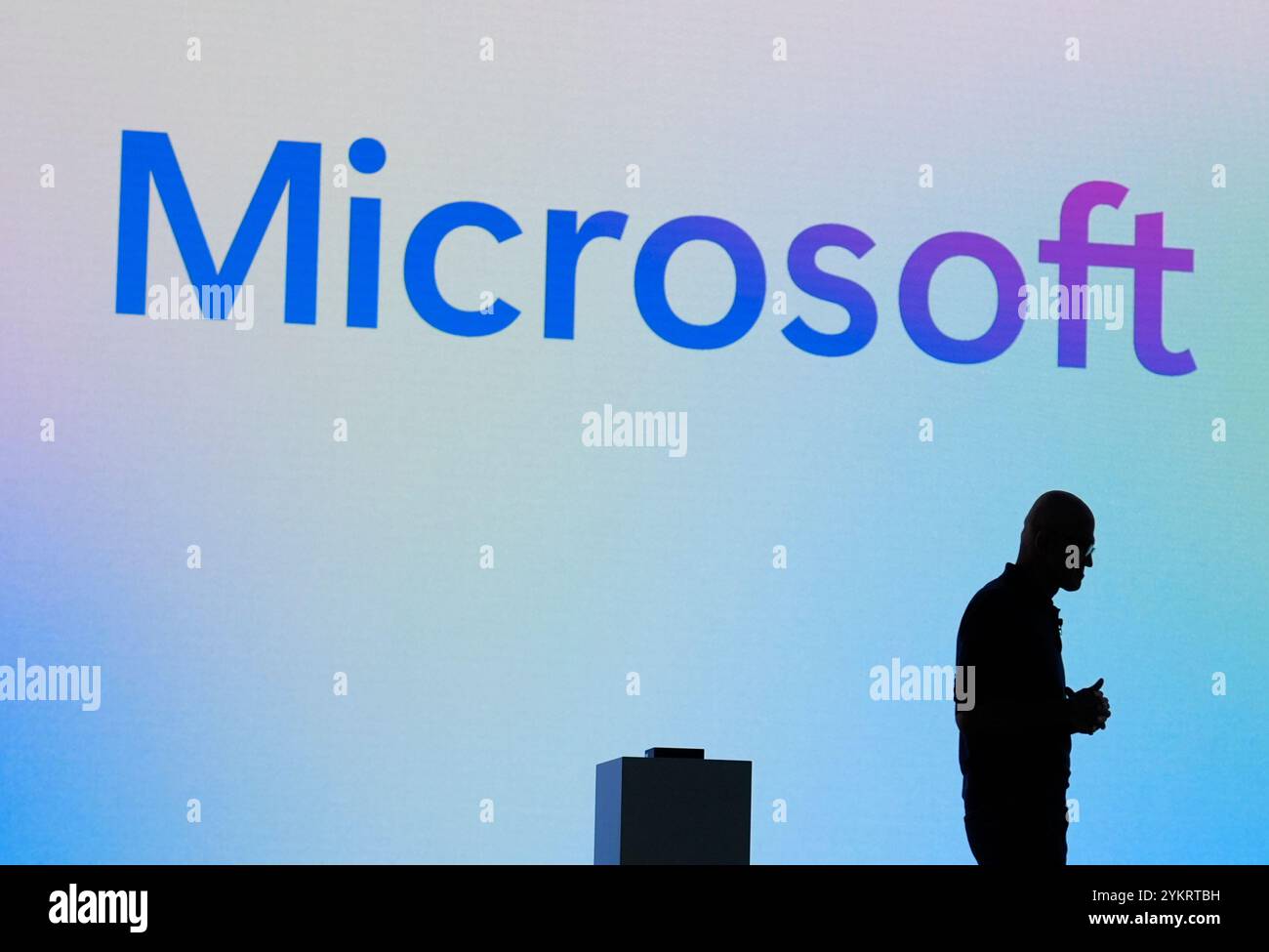 Microsoft CEO Satya Nadella stands in silhouette during the Microsoft ...