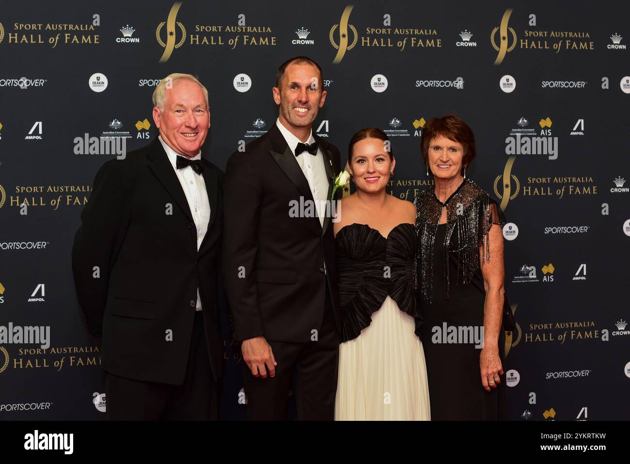Australian field hockey player Mark Knowles (CL) with his family at the ...