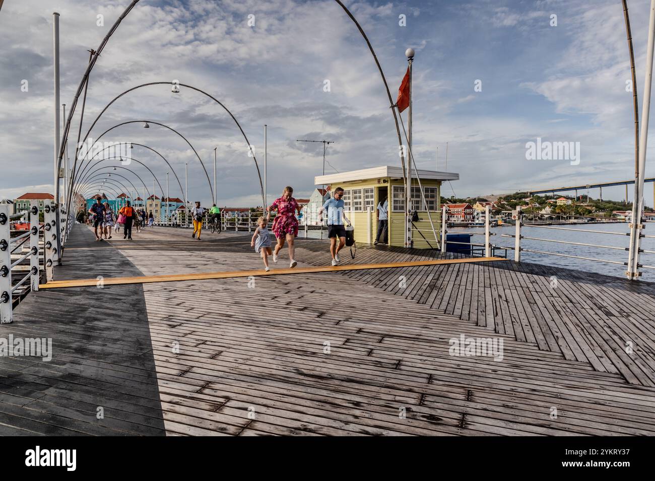 The Queen Emma Bridge is called the Swinging Old Lady. This 1888 ...