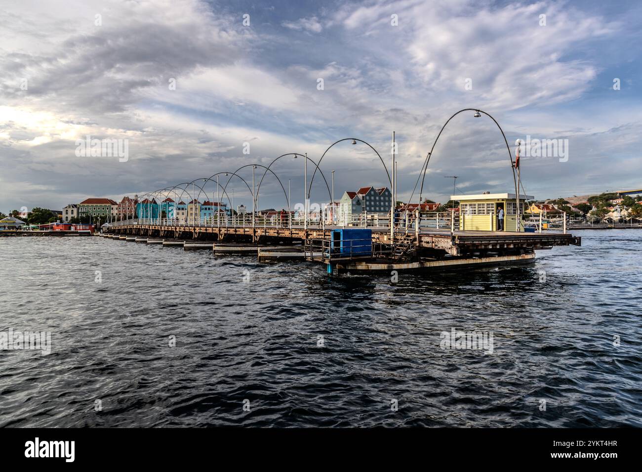 The Queen Emma Bridge is called the Swinging Old Lady. This 1888 ...