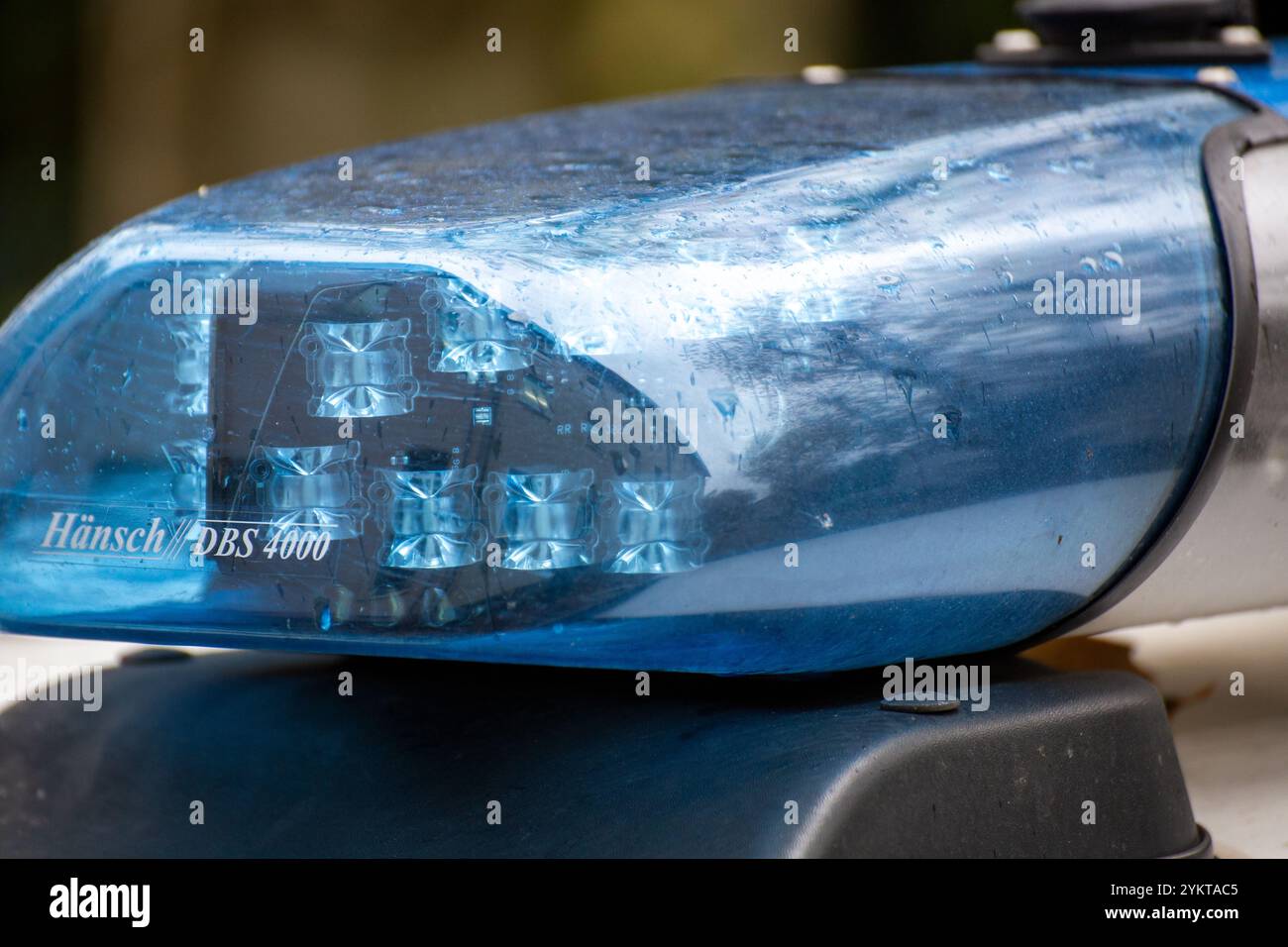 Symbol image police operation: Close up of a blue light on a police car ...