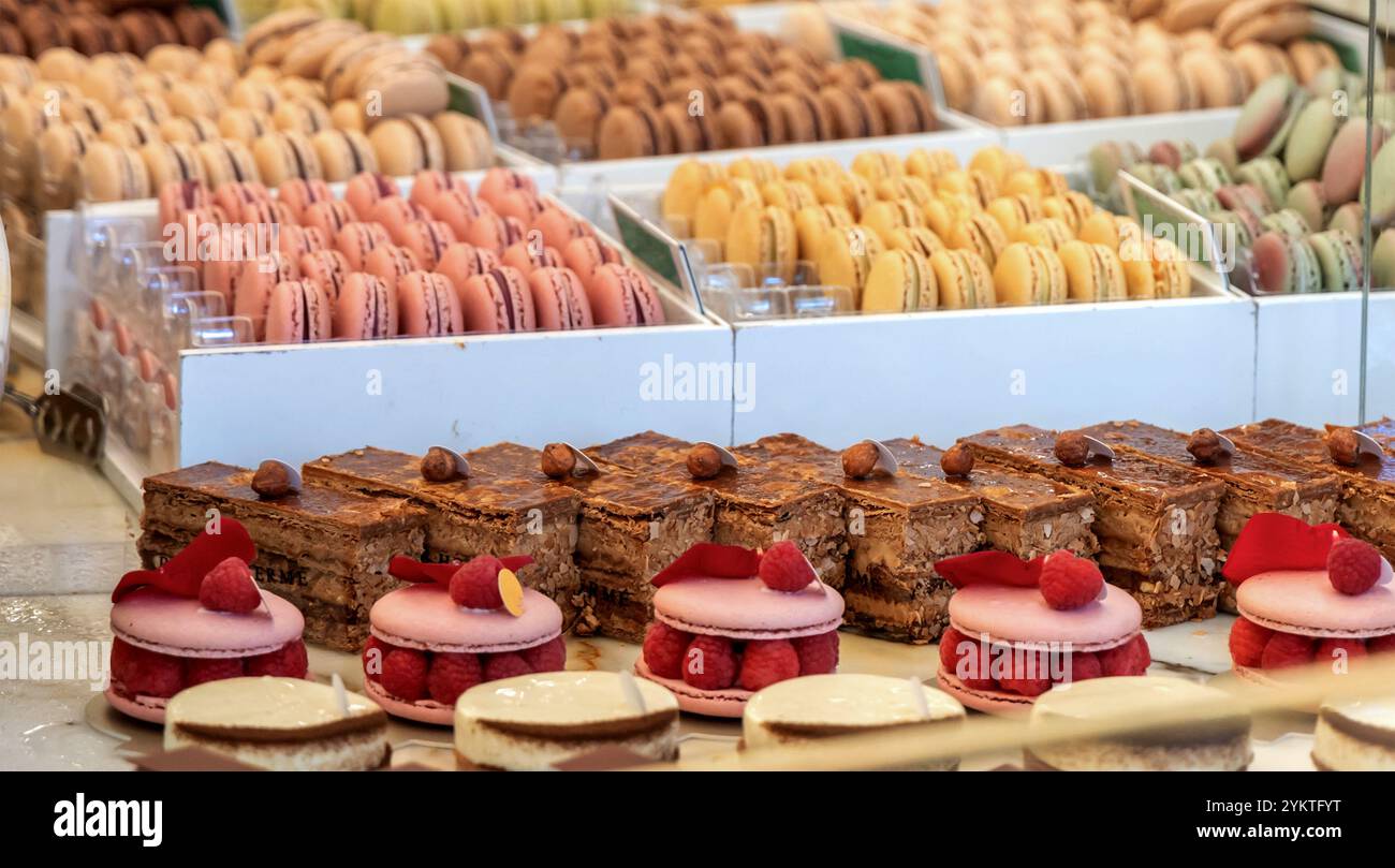 Various assortment of desserts confectionery on the counter in a bakery ...