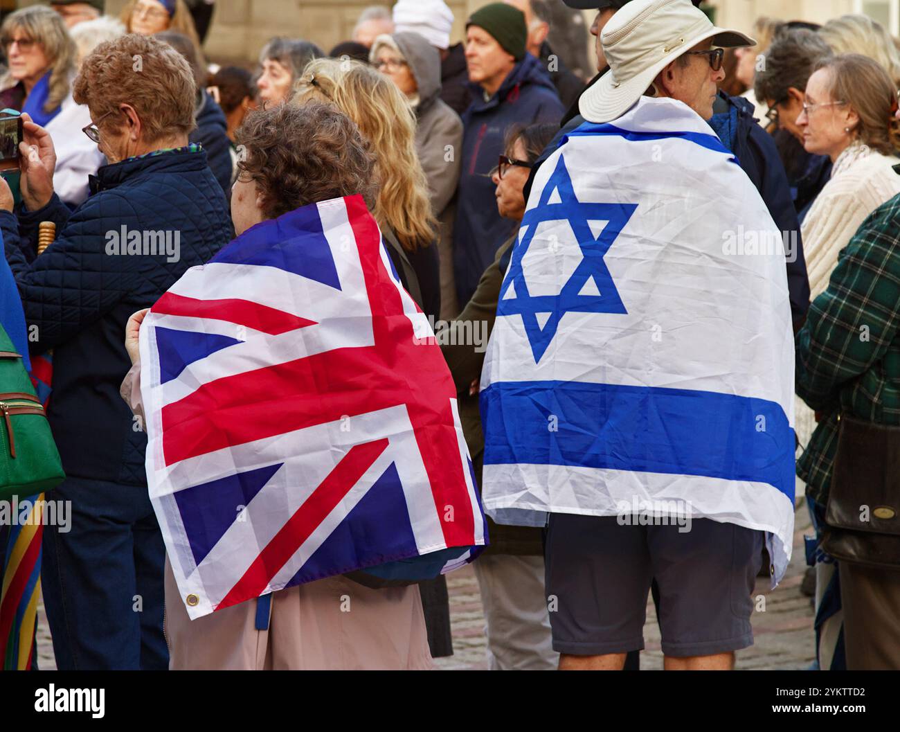 Woman In Union Jack Flag Standing Next To A Man Draped In The Flag Of ...