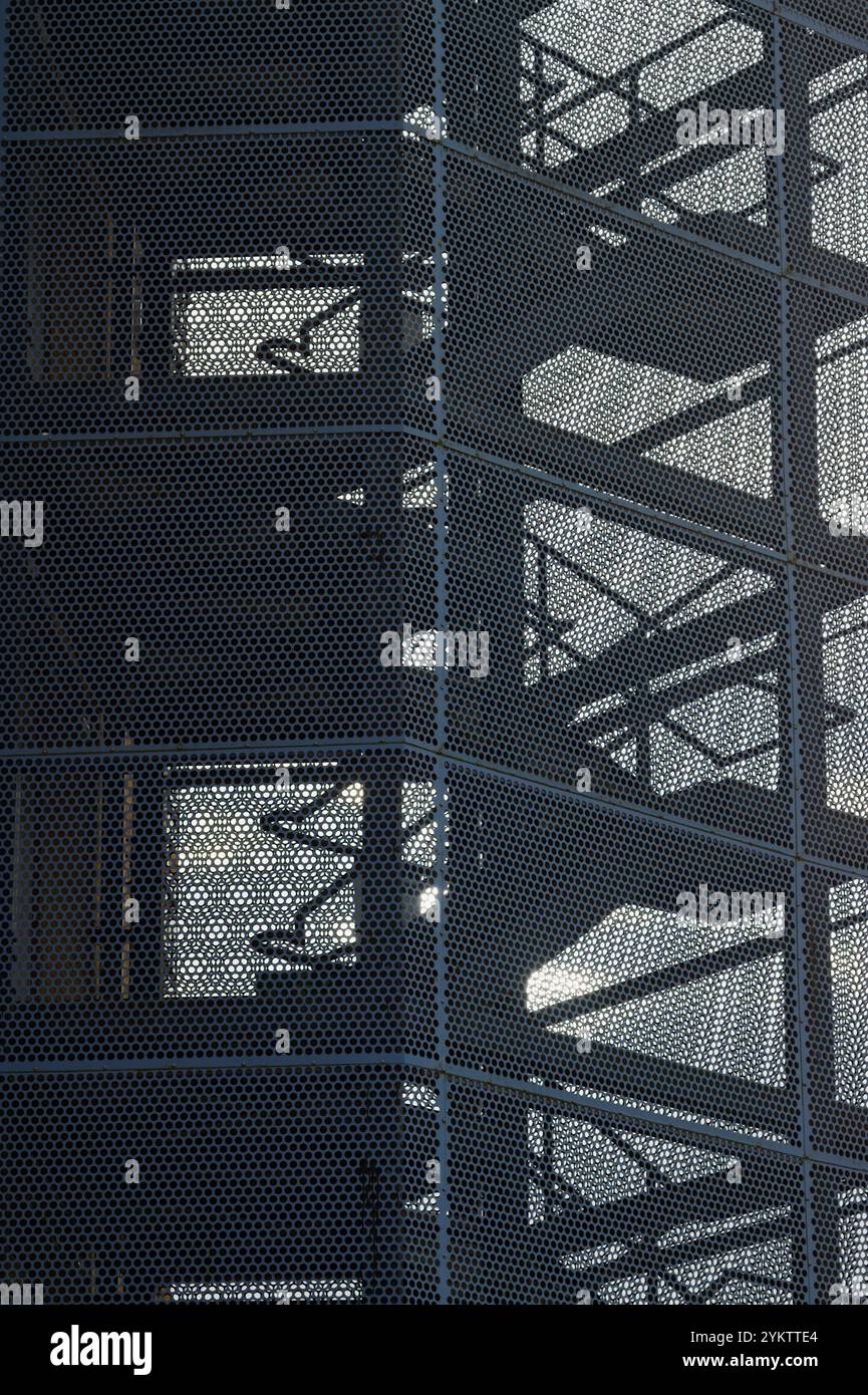 Silhouette Of An Outside Fire Escape Staircase Protected By A Metal ...