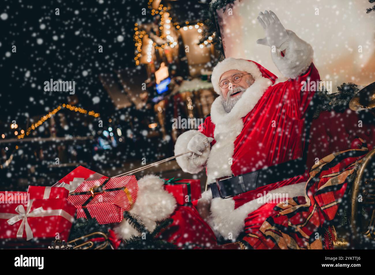 Photo of joyful man wear red costume hat sit sleigh pulled reindeer ...