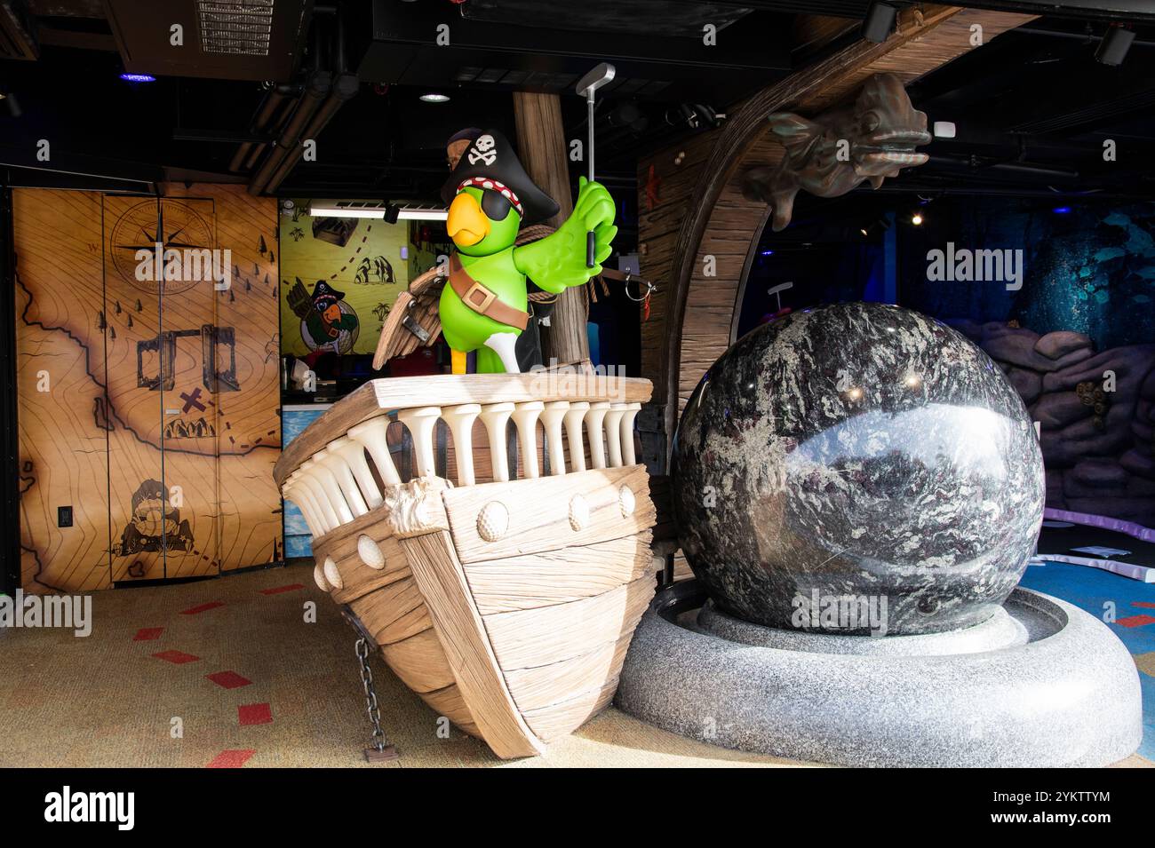 Green parrot and granite sphere water feature at Pirate Putt on Clifton ...