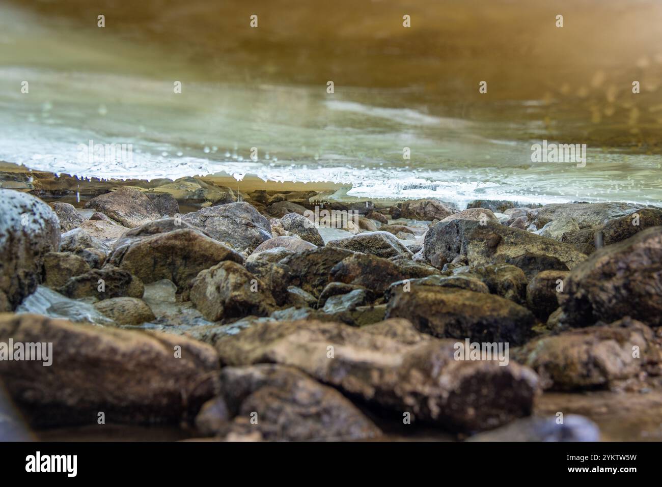 Under the ice of the Wheaton River that has started thawing out after ...