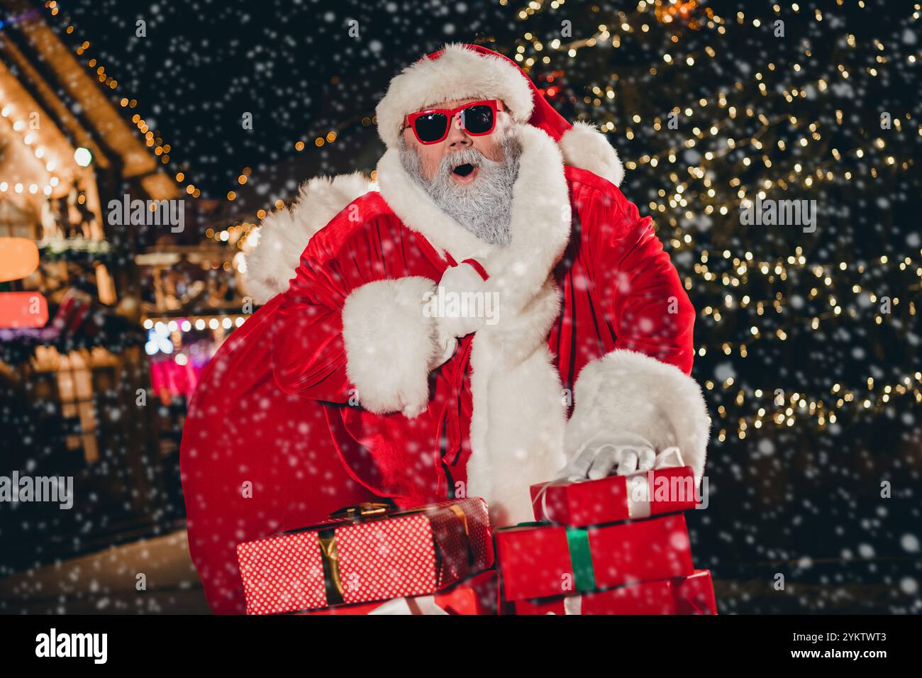 Photo of funky excited astonished santa carry presents bag pile stack ...